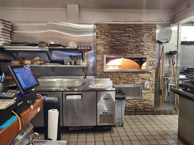 Where the magic happens – a kitchen with a stone pizza oven that reminds us all great seafood restaurants always have surprising talents up their sleeves.