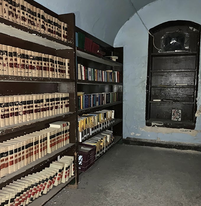 A prison library that reminds us that even in confinement, minds sought escape through pages when bodies couldn't through doors.