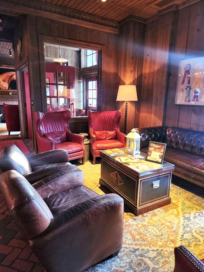 The lounge area doesn't just invite you to sit—it practically dares you to leave. Those leather chairs have probably heard some excellent stories.