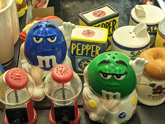 These M&M characters look suspiciously grumpy about their seasoning duties. Perhaps they'd rather be melting in your mouth than on your table.