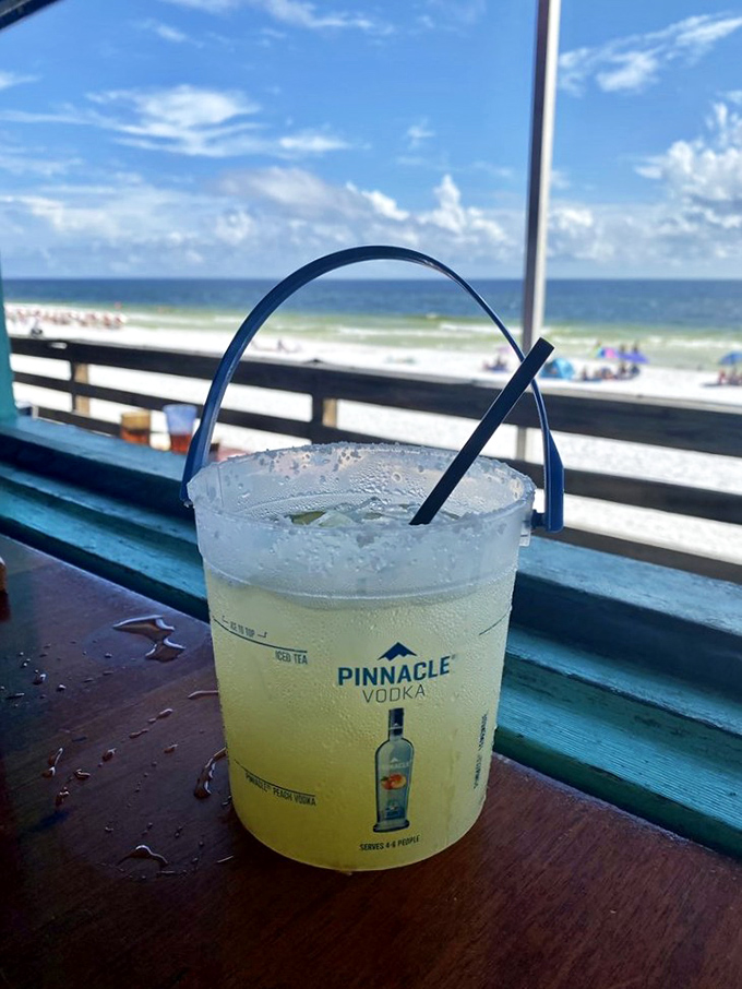 Nothing says "I'm officially on beach time" like a chilled cocktail with an ocean view that makes office cubicles seem like a distant nightmare.
