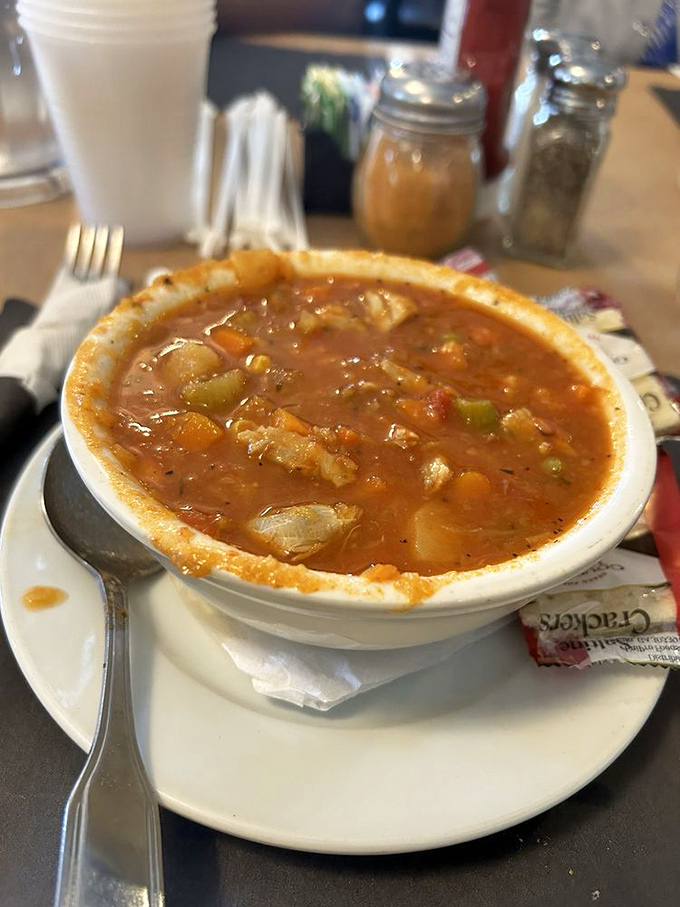 Maryland crab soup&mdash;where every spoonful tells the story of the Chesapeake, with chunks of crab playing hide-and-seek among the vegetables.