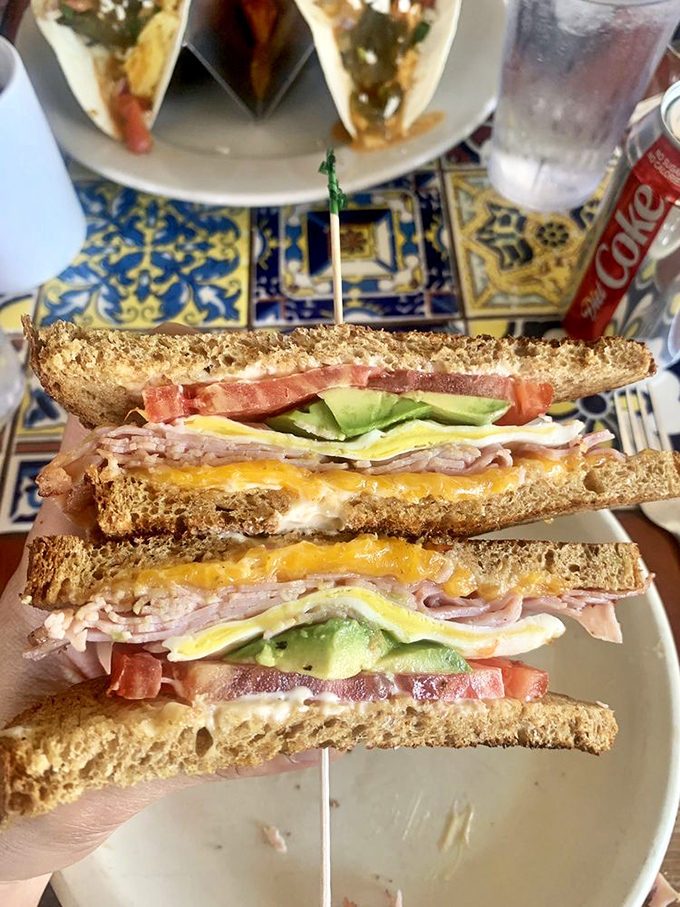 The mega egg sandwich lives up to its name with layers that defy both gravity and expectations. 