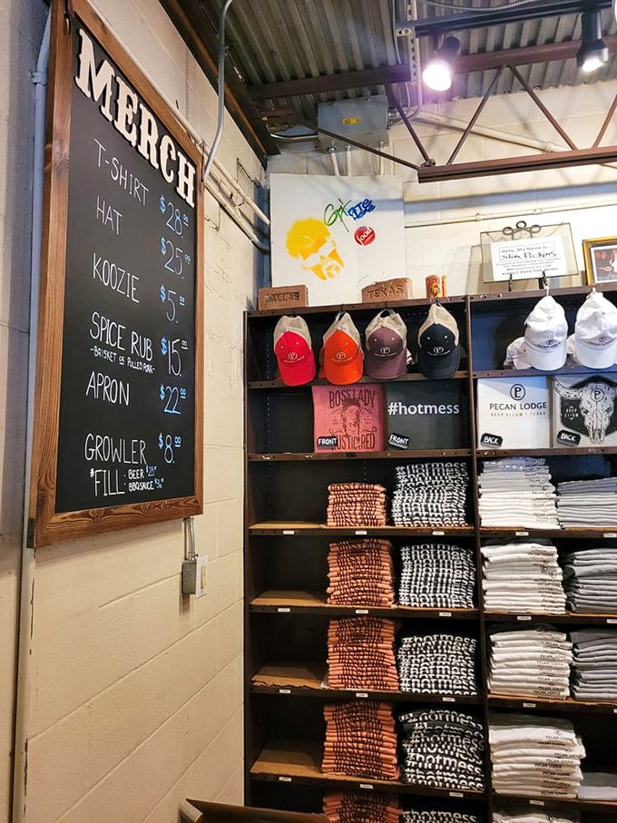 The merchandise wall for when you want to take home more than just leftovers—because wearing the t-shirt is easier than explaining the experience.