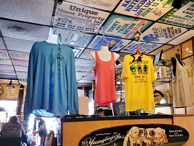 Merchandise that lets you take home bragging rights when your stomach can hold no more. The ceiling tiles above are like a guest book of happy memories.