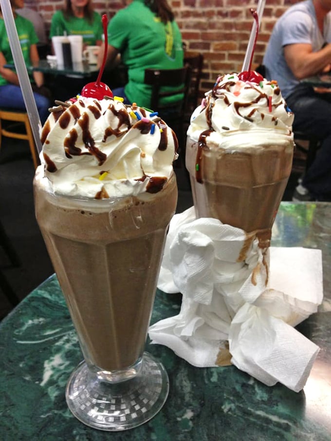 Milkshakes that blur the line between beverage and dessert. Those cherries aren't just garnish—they're the exclamation points on a sweet statement.