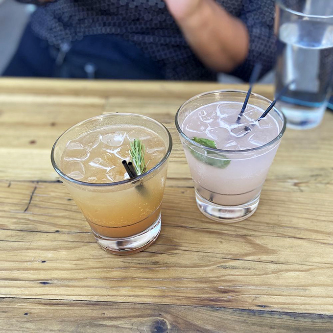 Craft mocktails that prove alcohol isn't required for sophisticated sipping. These glasses hold liquid refreshment that's both playful and refined.