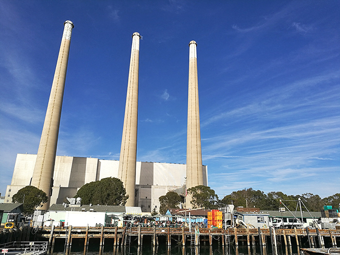 Those iconic smokestacks have become unexpected landmarks, proving industrial can sometimes be oddly beautiful.