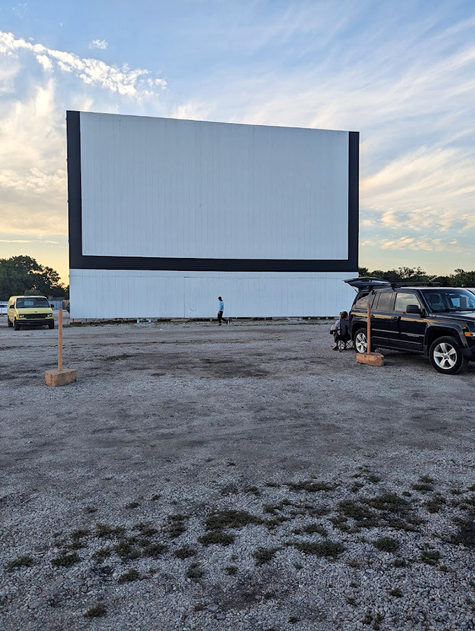 The massive blank canvas awaits dusk's arrival, when it will transform into a towering window to other worlds and adventures.