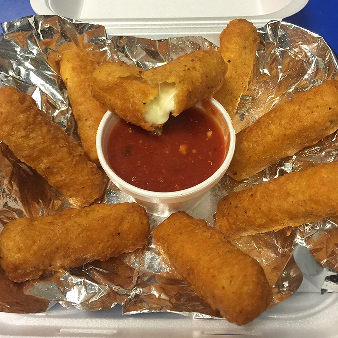 Mozzarella sticks that stretch like your favorite sweater after Thanksgiving dinner. Crispy outside, molten cheese inside—pure magic.