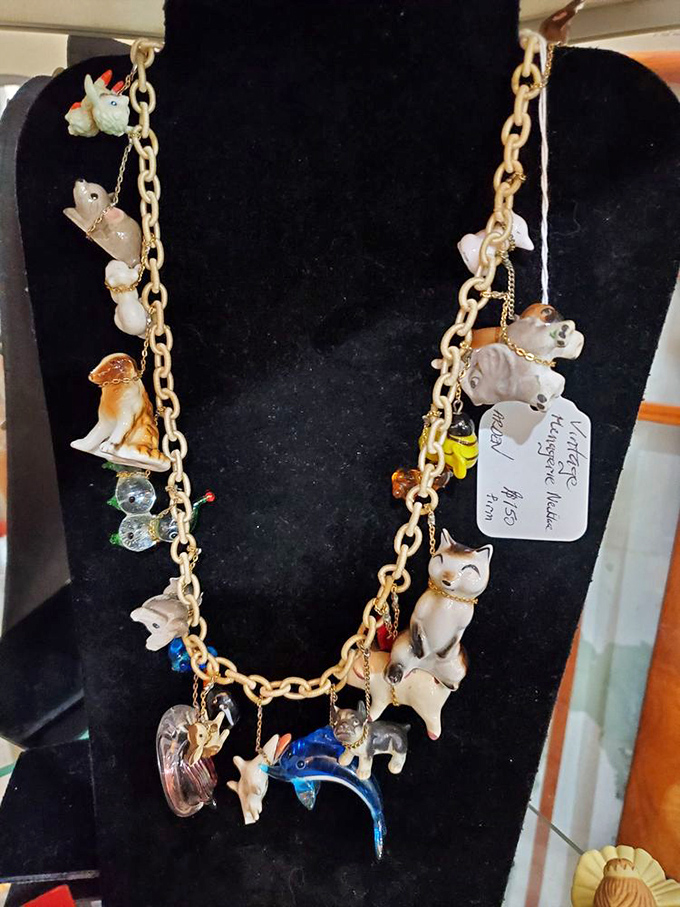 A menagerie around your neck! This whimsical charm necklace features tiny animals that would make any vintage jewelry lover swoon.