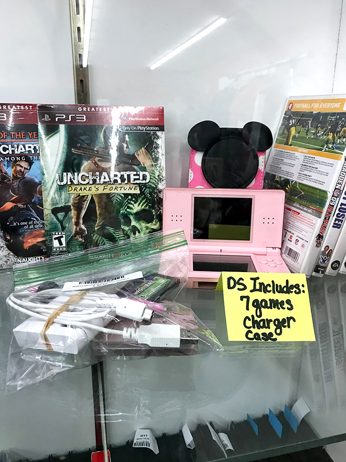 Gaming gold for the nostalgic player! That pink Nintendo DS with Mickey ears is practically begging for a second chance at digital adventure.