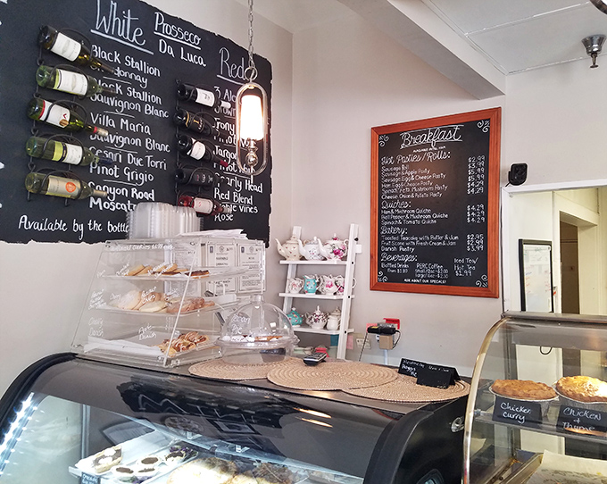 Wine bottles line the wall like soldiers guarding treasure, while pastry cases display the real crown jewels.