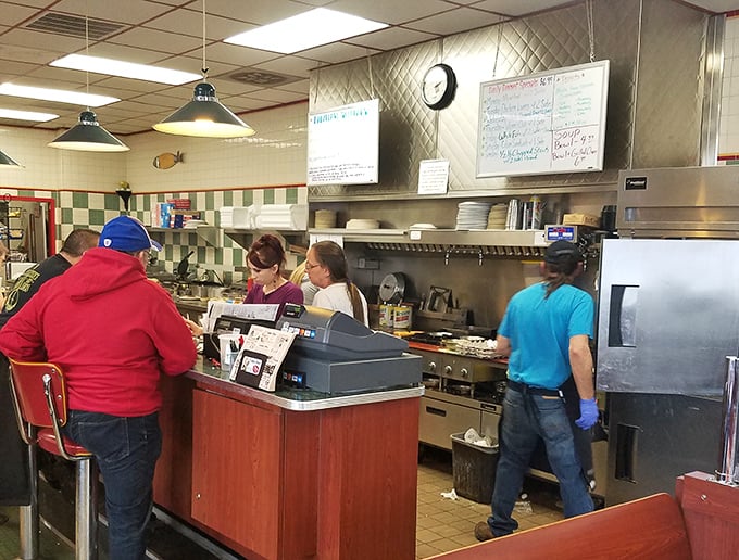 The counter where regulars perch and newcomers become regulars. Notice the perfectly positioned condiments&mdash;these people know what they're doing.