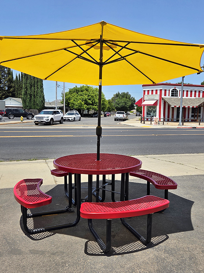 That yellow umbrella isn't just providing shade&mdash;it's marking the spot where memories are made, one crinkle-cut fry at a time.