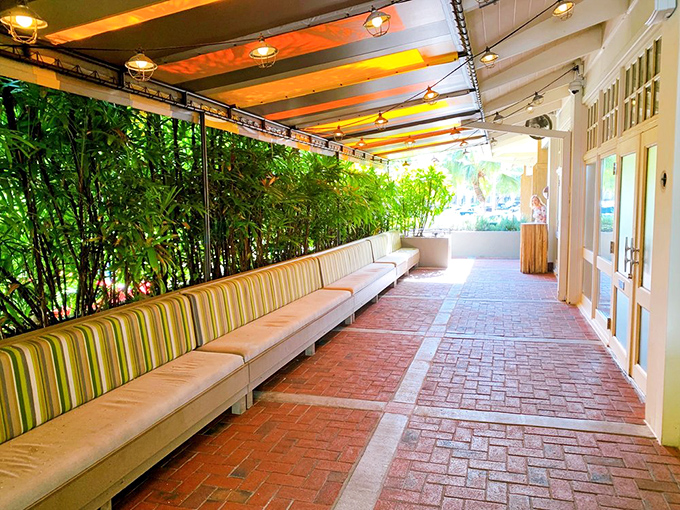 The waiting area isn't just comfortable&mdash;it's strategic. Those bamboo plants create natural privacy while you anticipate seafood greatness.