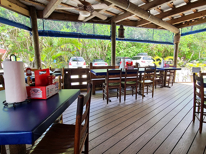 Island dining at its most authentic. The outdoor deck offers fresh air, wooden charm, and a break from your air-conditioned vacation routine.