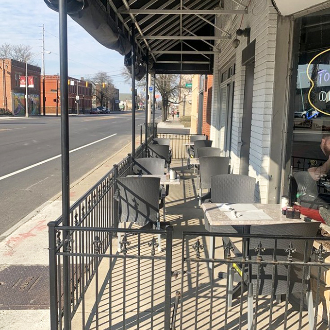 Sidewalk seating for those rare Ohio days when the weather behaves &ndash; perfect for people-watching with your coffee refill.