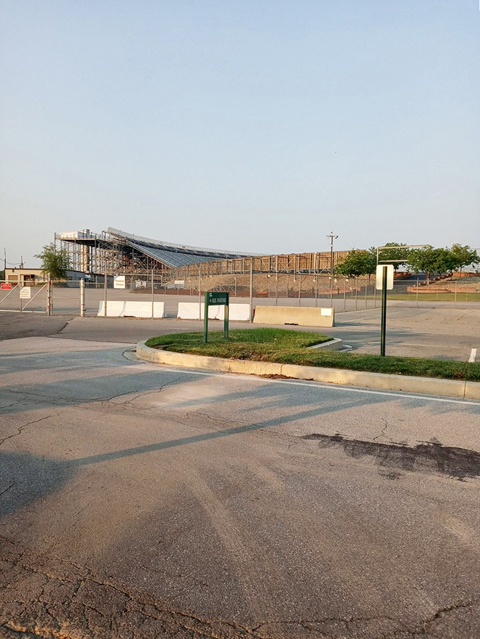 The real action happens on the track, where drivers navigate "The Monster Mile" while Miles himself watches with stony approval.