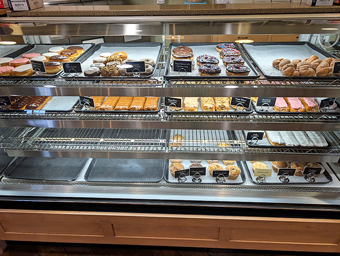 The pastry case: where willpower goes to die a delicious death. Each shelf offers sweet temptations that make "I'll just look" the biggest lie you'll tell yourself today. 