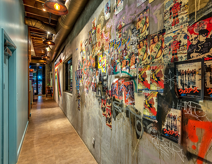 The hallway to hamburger heaven is paved with Japanese pop culture posters, creating an immersive experience before you even place your order.