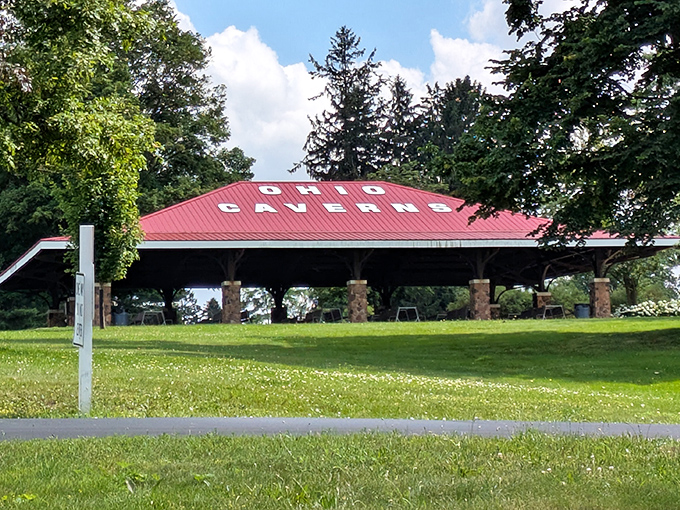 The iconic red pavilion welcomes visitors back to daylight. A perfect spot to picnic and process the underground wonders you've just witnessed.