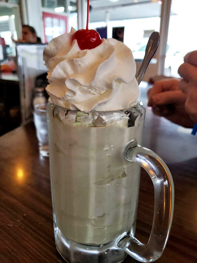 A frosty mug of minty heaven topped with a cloud of whipped cream. This shake doesn't just satisfy&mdash;it creates memories with every sip.