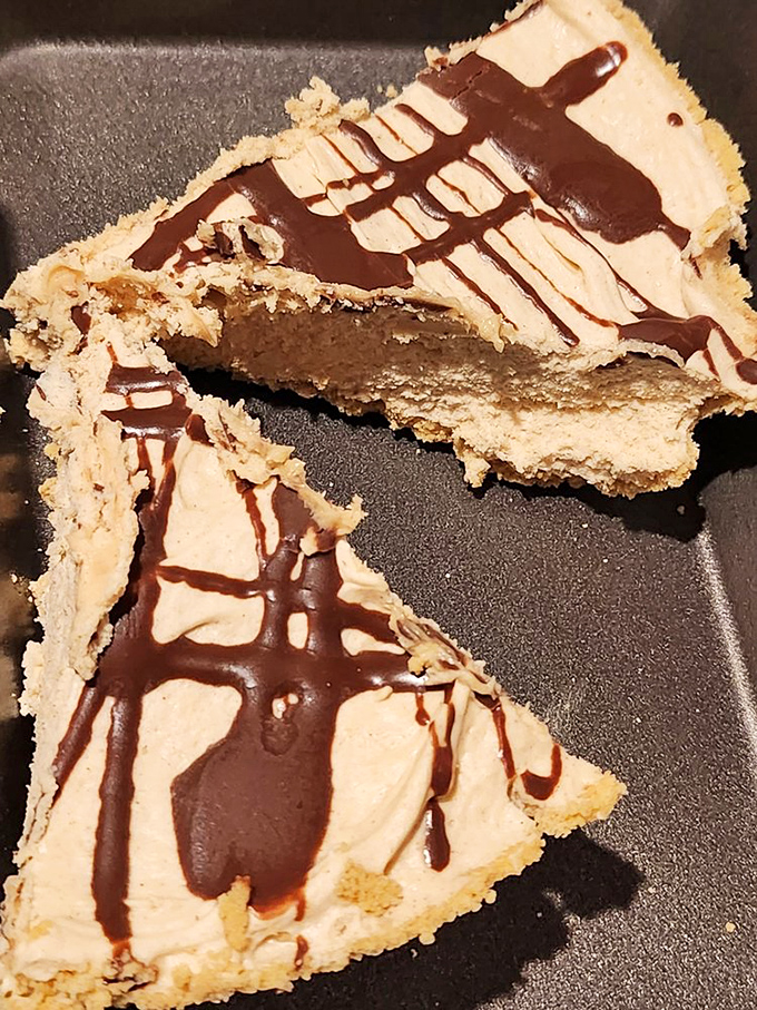 Peanut butter pie with chocolate drizzle&mdash;where comfort food meets elegant dessert. Even after a massive steak, you'll mysteriously find room for this.