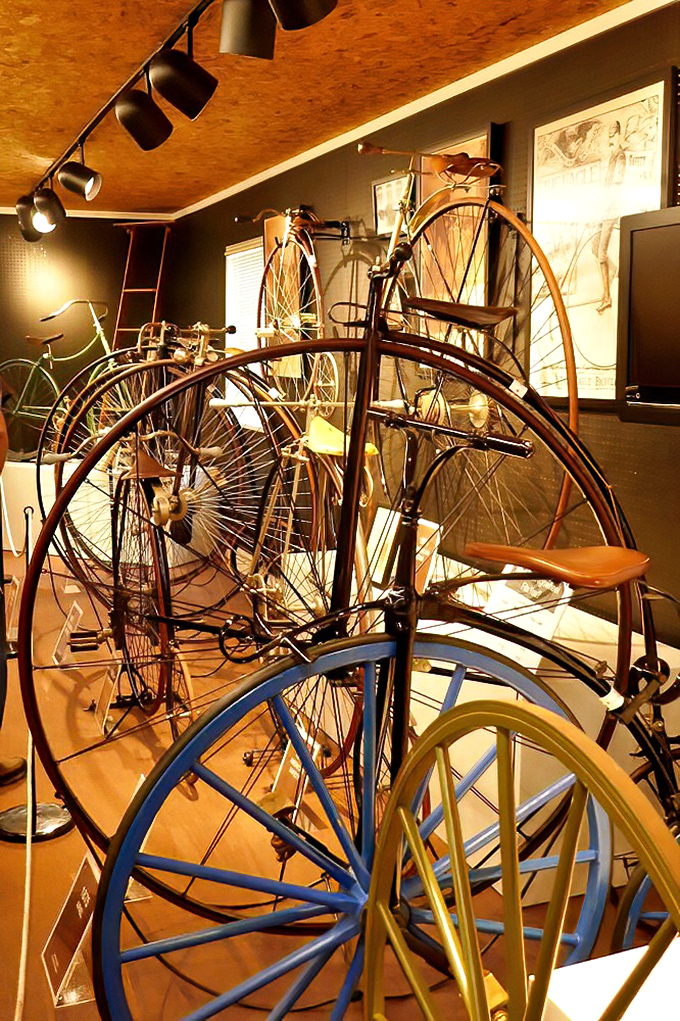 Penny-farthings cluster like mechanical giraffes. These high-wheelers weren't just transportation&mdash;they were daredevil status symbols for the Victorian influencer.