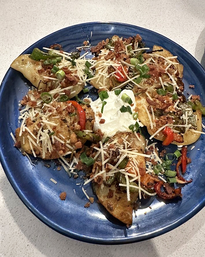 Not your grandmother's pierogies! These golden pockets of joy come loaded with savory fillings and topped with melty cheese and fresh scallions.