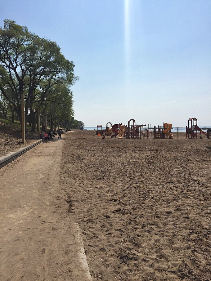 Sandy pathways lead to childhood joy&mdash;a playground with Lake Erie's endless blue horizon as its impossible-to-top backdrop.