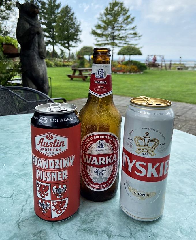 The holy trinity of Polish brews&mdash;Tyskie, Warka, and Austin Brothers&mdash;standing at attention on a table with Lake Michigan providing the perfect backdrop.