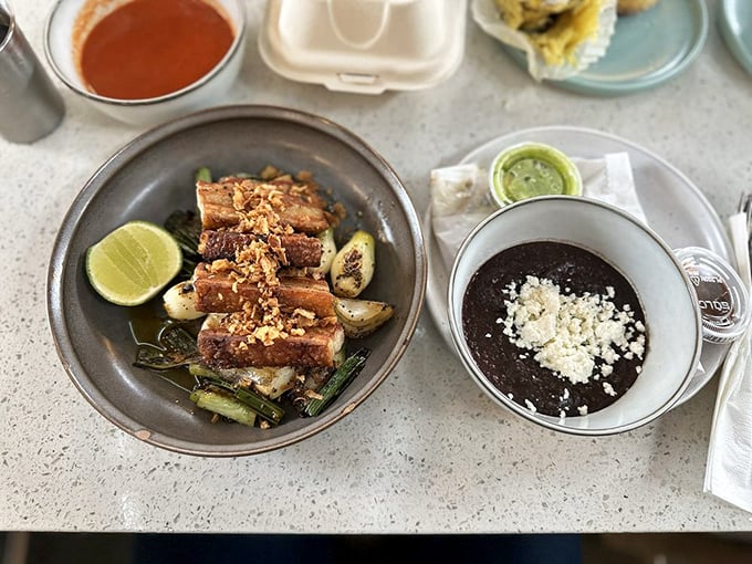 Pork belly surrounded by crispy bits and a sauce center. It's like a meat galaxy with flavor orbiting around that perfect spicy core.