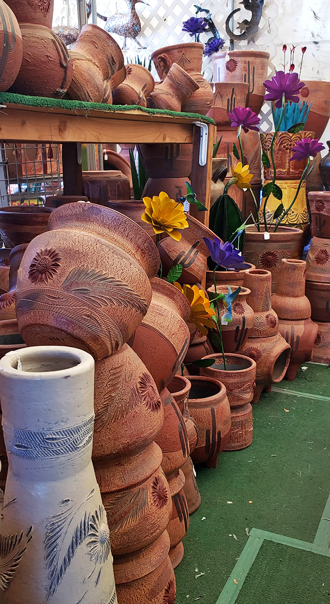 Terracotta treasures stacked like a clay metropolis. Add a succulent, and suddenly you're the neighborhood's gardening guru!