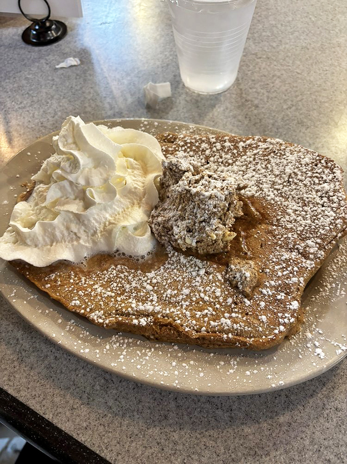 Not just a pancake&mdash;a canvas of autumn comfort topped with whipped cream clouds. The kind of breakfast that makes you reconsider your life choices&mdash;in the best way.
