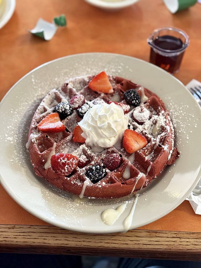 This Red Velvet Waffle with berries and cream is what breakfast looks like in your dreams. Dessert masquerading as morning fuel.