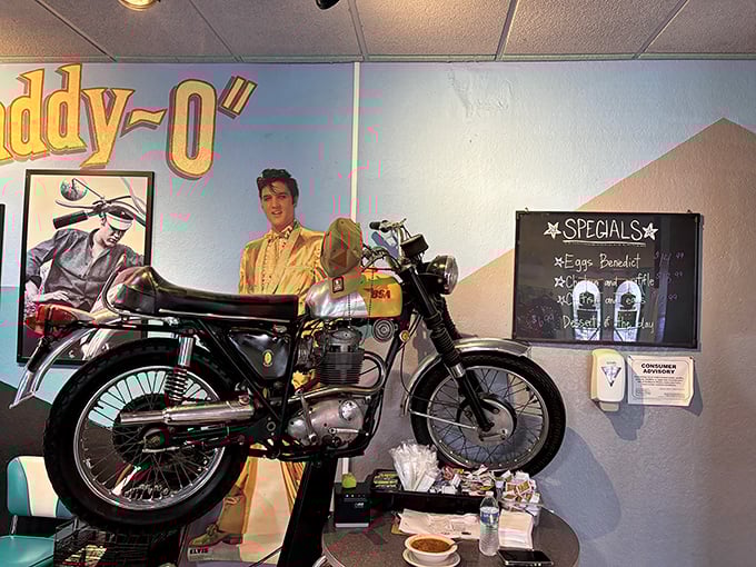 That vintage motorcycle and Elvis poster aren't just decoration&mdash;they're time travel companions while you wait for your pancakes. Rock and roll meets over-easy.