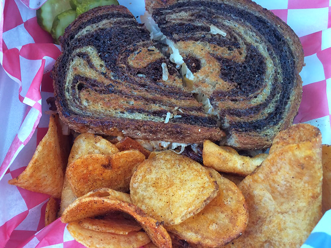 This Reuben isn't just marbled&mdash;it's practically a Renaissance masterpiece of swirling rye, with melted cheese that would make Michelangelo weep.