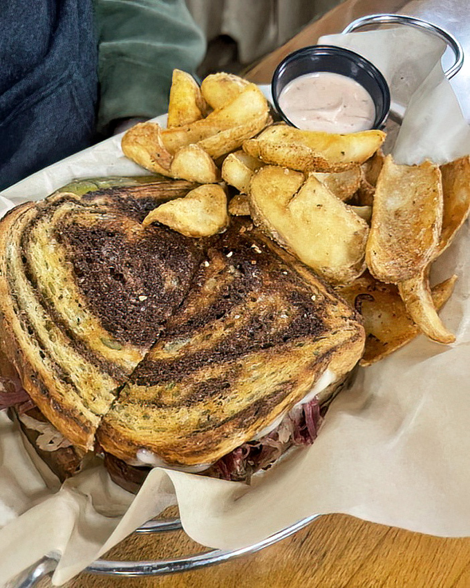 A Reuben sandwich that doesn't skimp on the good stuff. That perfectly grilled marble rye holds treasures that would make New York delis jealous.