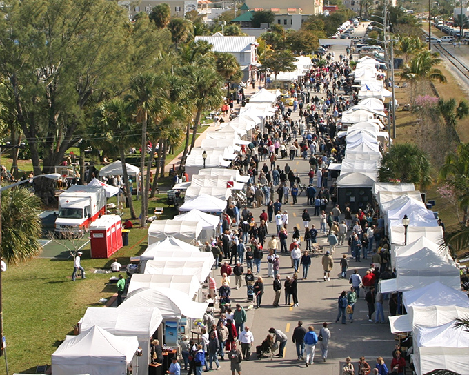 White tents line the street during one of Stuart's many festivals &ndash; where local vendors prove Florida culture goes far beyond mouse ears and theme parks.