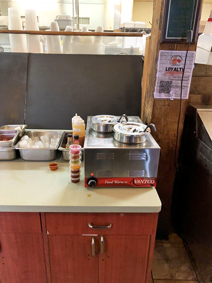 The barbecue condiment station: where sauce decisions become life decisions. Choose wisely, but remember there are no wrong answers.