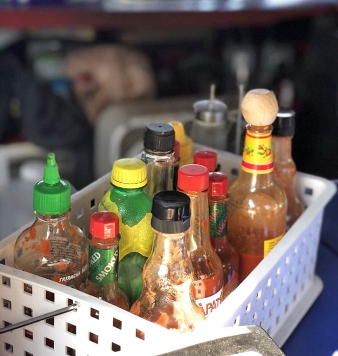 The condiment collection &ndash; where flavor adventures begin. These bottles hold the secret weapons that allow each diner to customize their maritime feast.