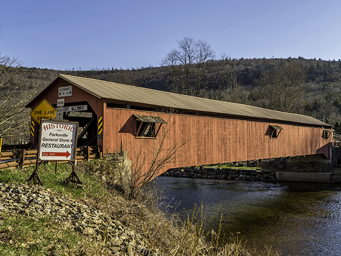 One-lane traffic and centuries of stories flow through this wooden time capsule. Rush hour here means waiting for a family of deer to cross.