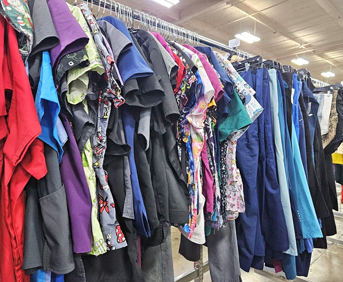 The clothing racks: a textile library where each garment tells a story, and your next favorite outfit is hiding in plain sight.