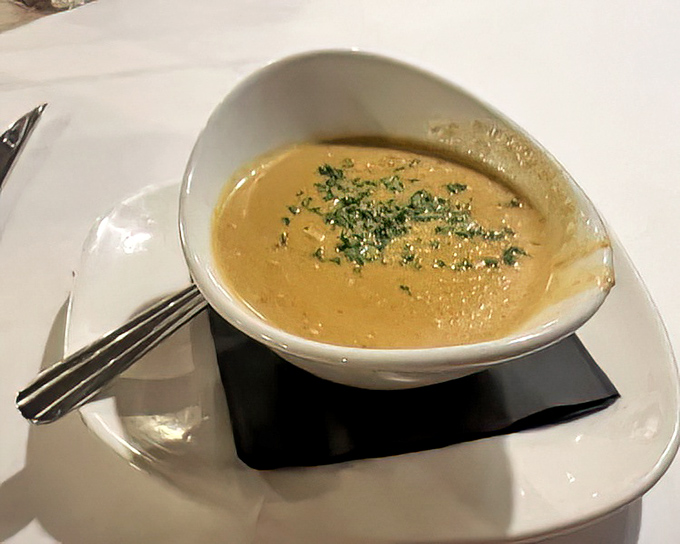This isn't just soup &ndash; it's liquid velvet with seafood essence, the kind that makes you consider drinking straight from the bowl.