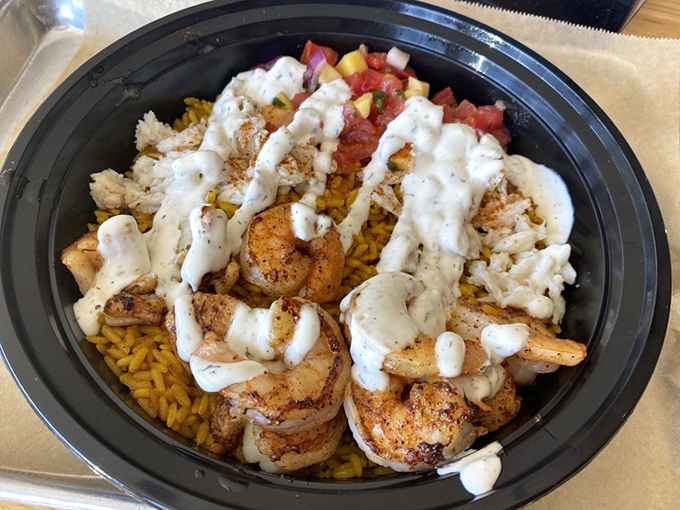 Seafood bowls that make you wonder why you'd ever eat seafood any other way&mdash;perfectly seasoned shrimp over saffron rice with house-made sauce.