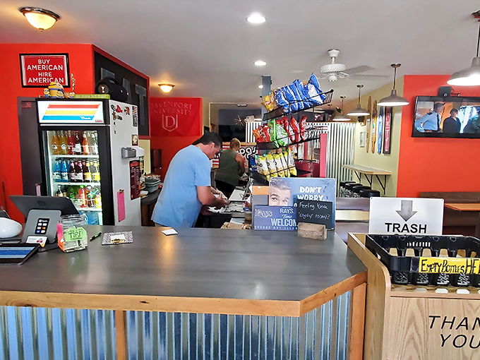 Behind this counter, hot dog artists work their magic, transforming humble franks into the culinary equivalent of a standing ovation.