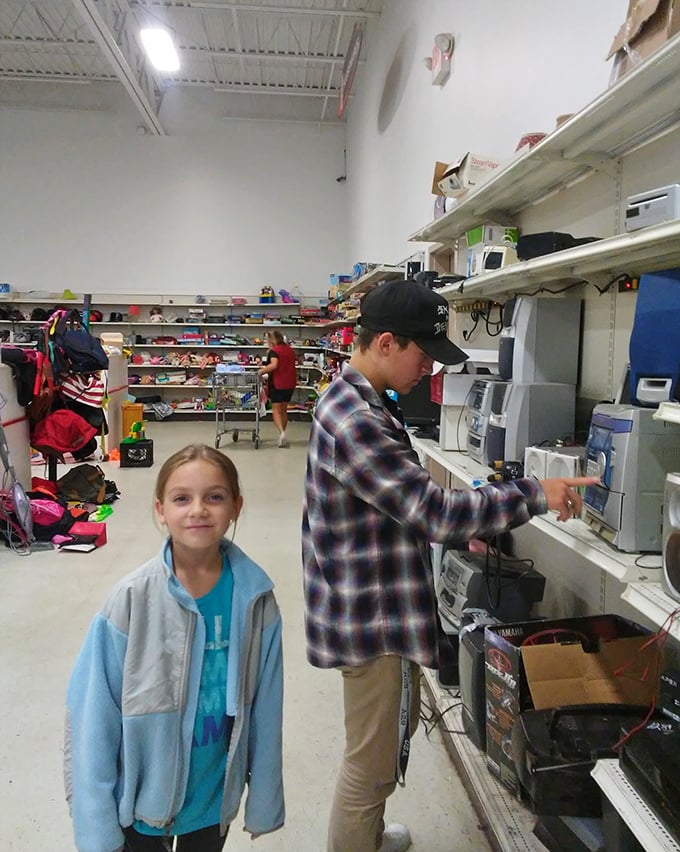 The electronics section offers a testing area where savvy shoppers can ensure that second-hand gadgets are ready for their new homes.