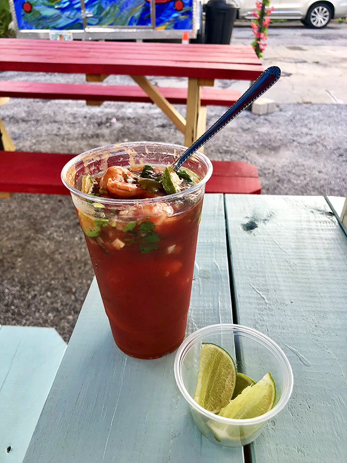 The Bloody Mary's sophisticated cousin—a seafood cocktail swimming in tangy tomato goodness with lime standing by for extra zip.