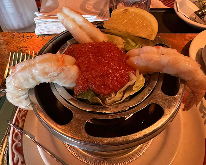 The shrimp cocktail &ndash; those curved crustaceans standing at attention around their saucy center like delicious sentinels guarding flavor itself.